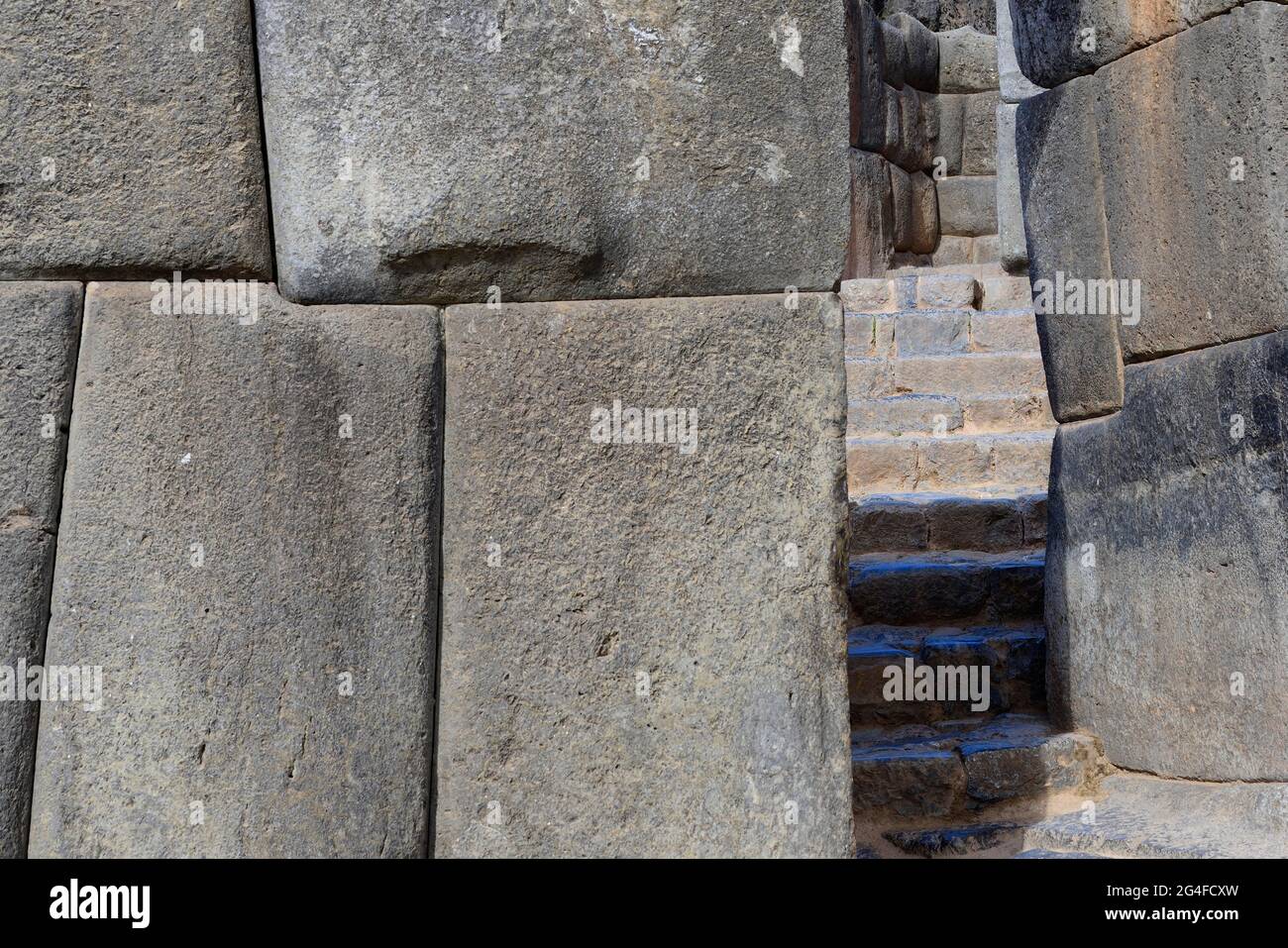 Stone gate in the fortress walls of the Inca ruins Sacsayhuaman, Cusco ...