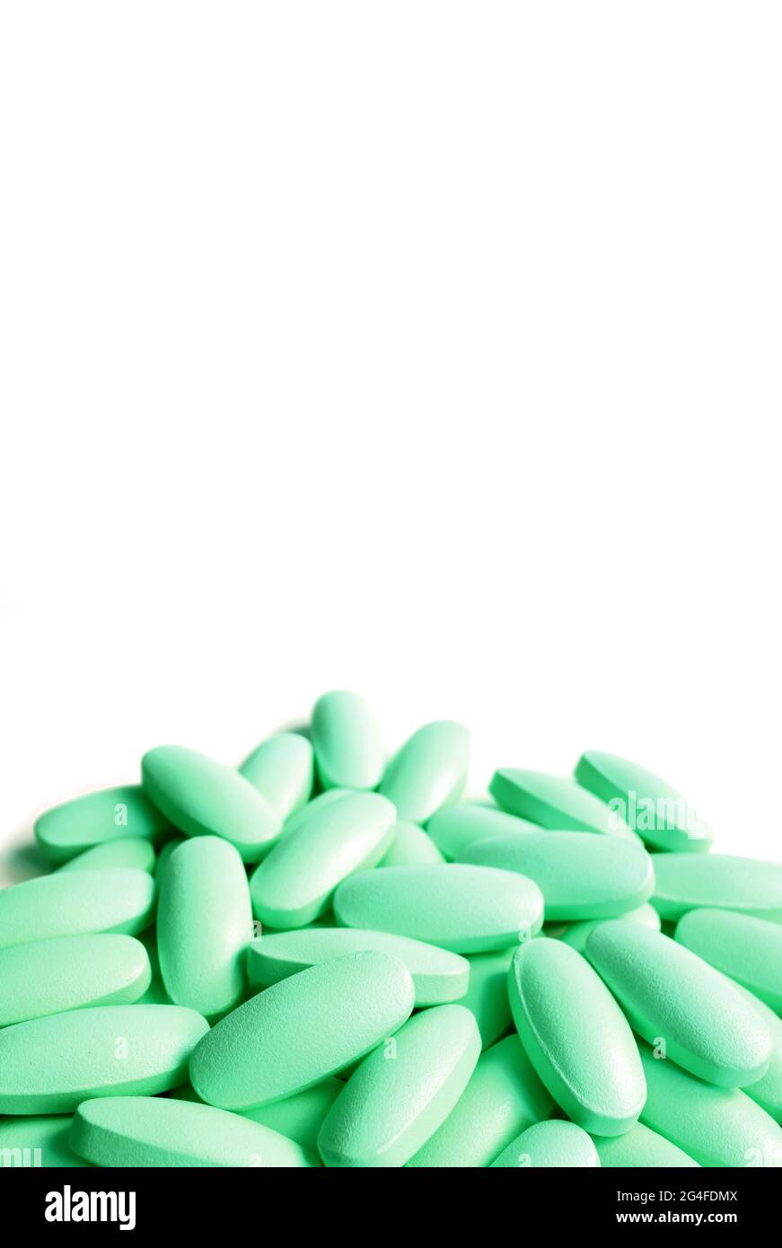 Pile of mint green pills on white background with copy space Stock ...