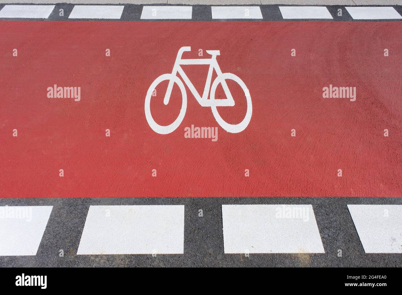 Cycle path with pictogram at a junction, North Rhine-Westphalia ...