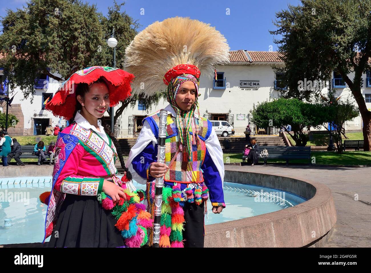 Indigenous couple of a dance group in colorful traditional costume ...