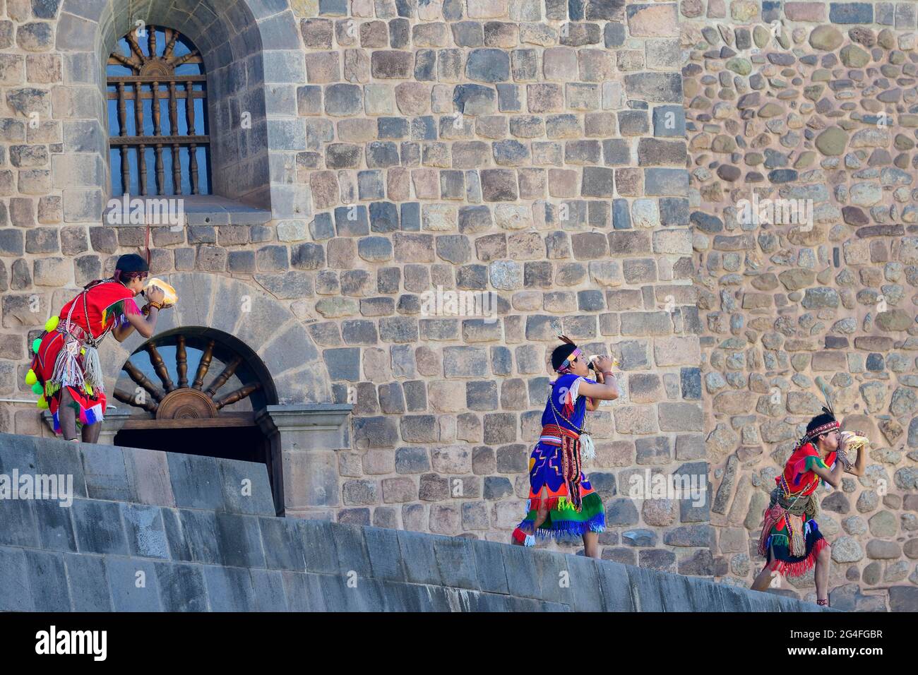 Inti Raymi, festival of the sun, shell blowers on the walls of the ...