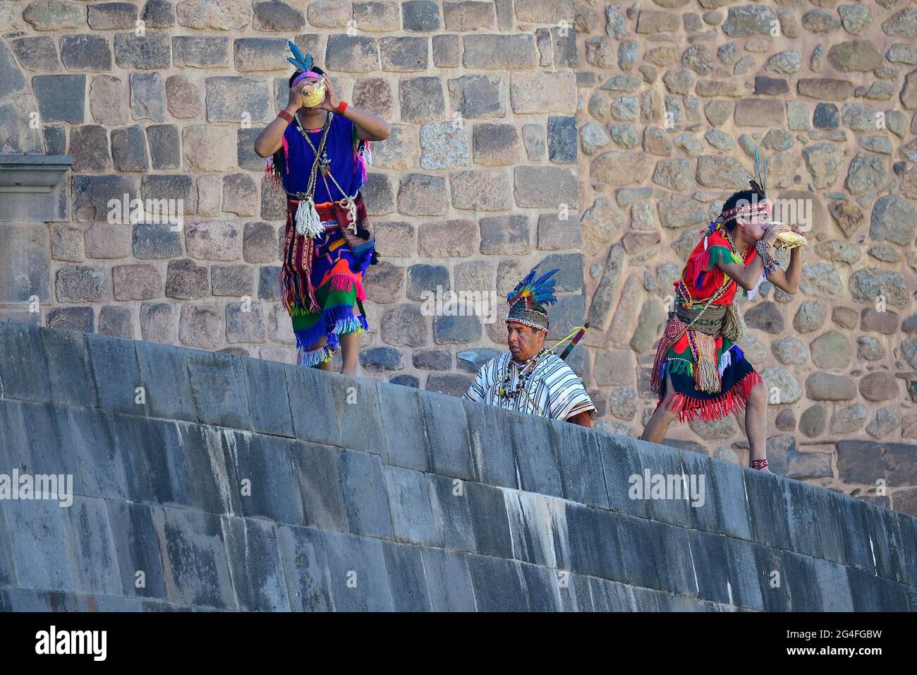 Inti Raymi, festival of the sun, shell blowers on the walls of the ...