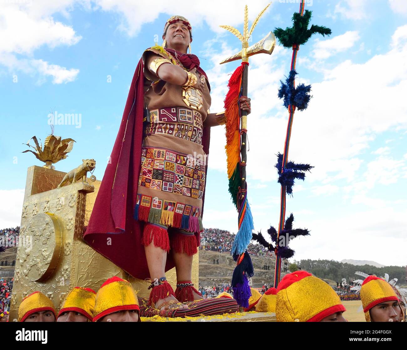 Inti Raymi, festival of the sun, ruler standing on his palanquin, ruins ...