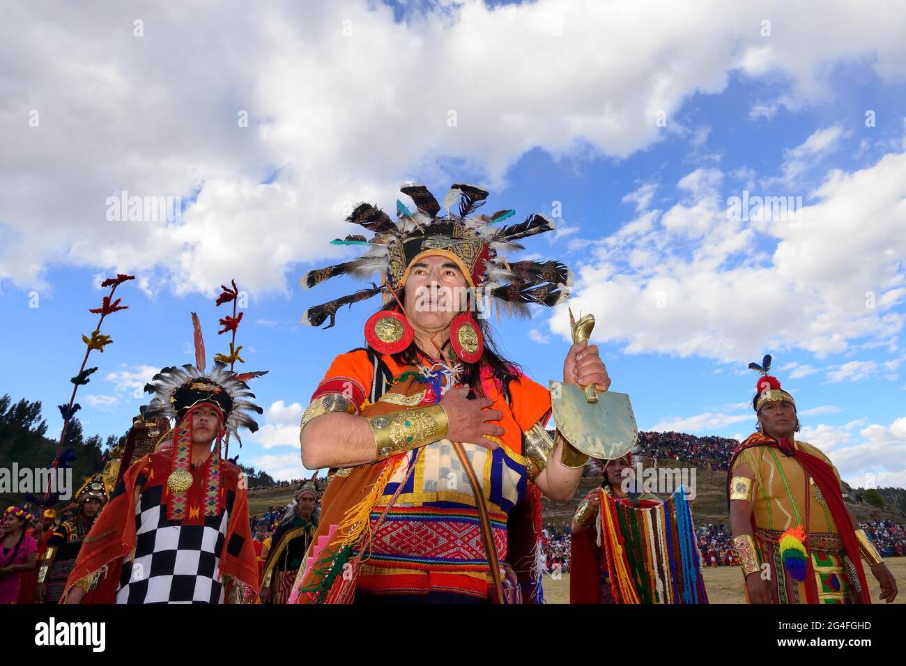 Inti Raymi, festival of the sun, priest with feather crown, ruins of ...