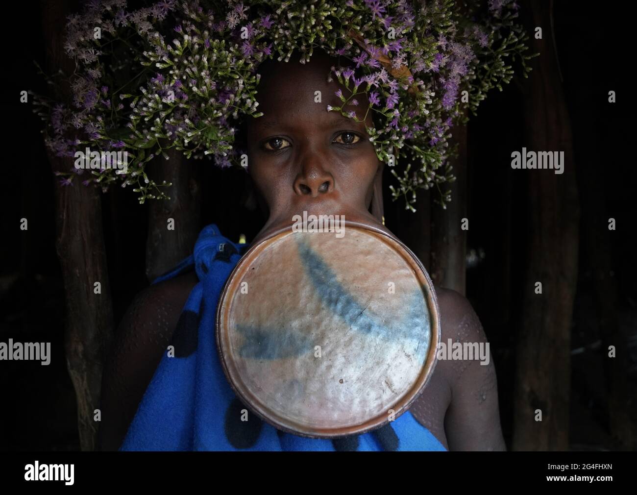 The lip plates, also known as lip plugs are to enhance beauty. ETHIOPIA ...