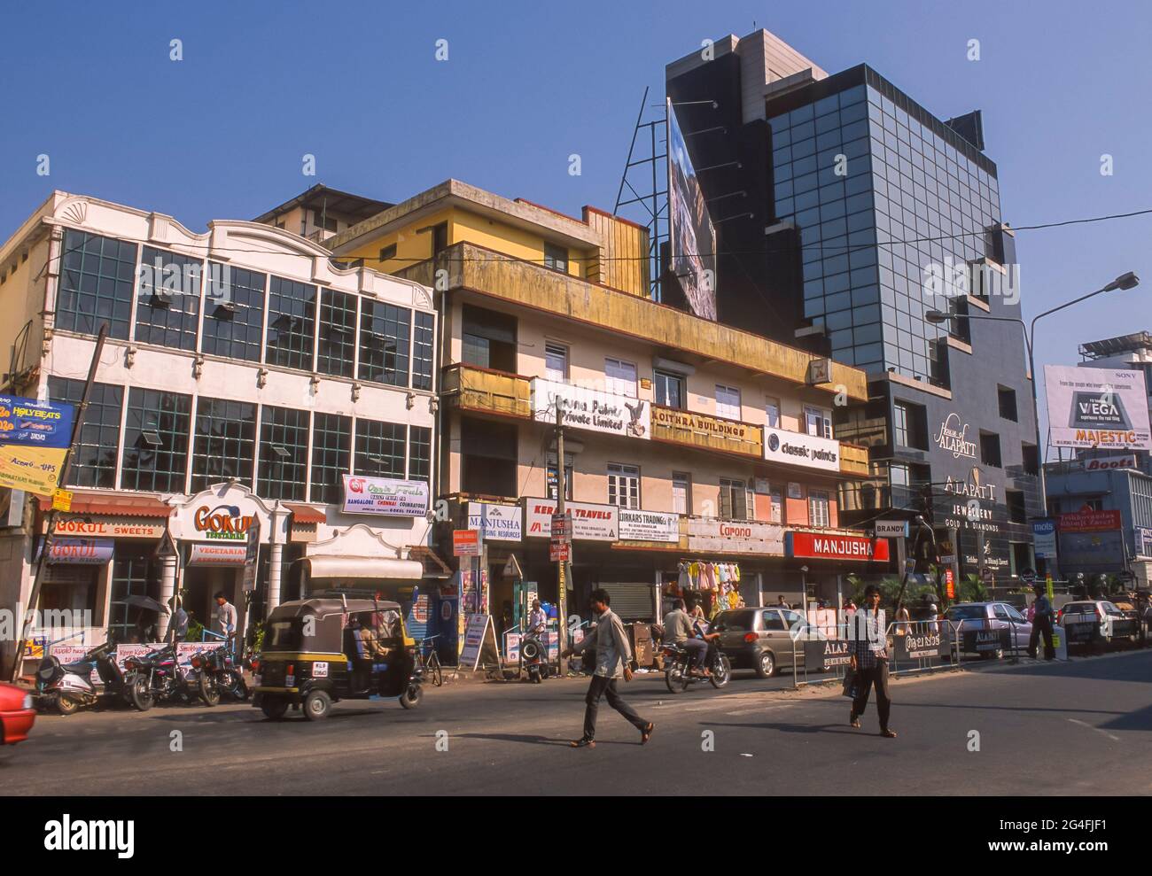 KOCHI, KERALA, INDIA - Street scene with shops and people Stock Photo ...