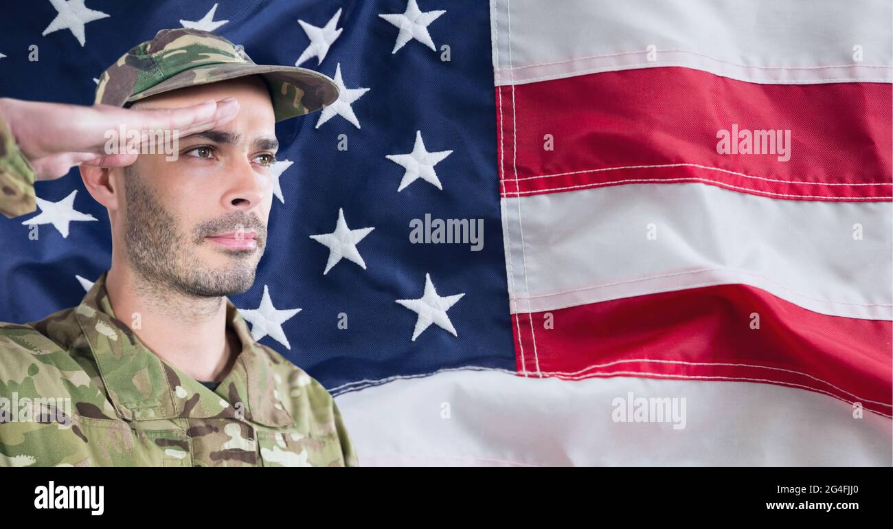 Waving american flag over soldier hi-res stock photography and images ...