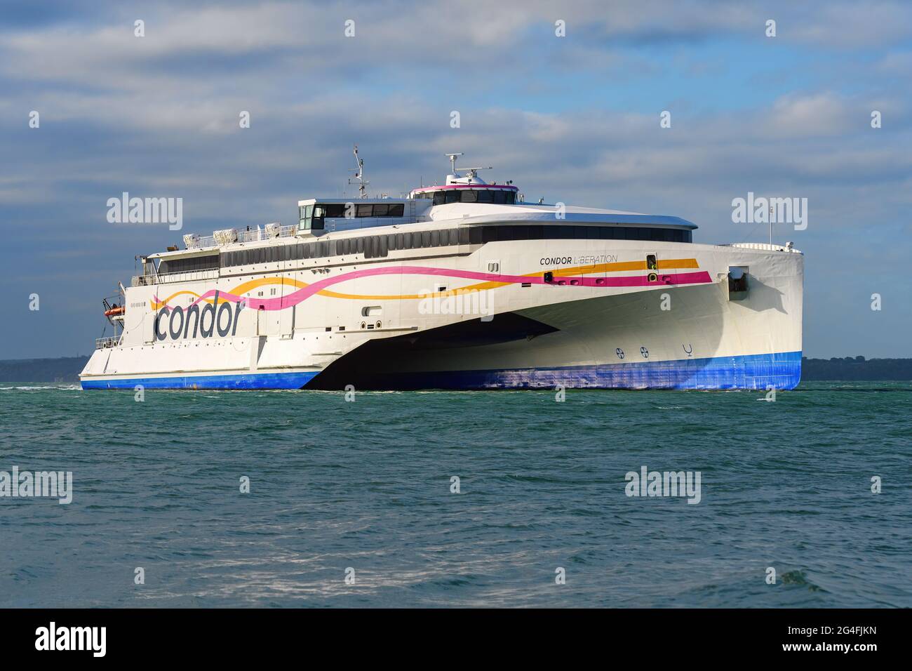 The trimaran Condor Liberation operates a high-speed ferry link between ...