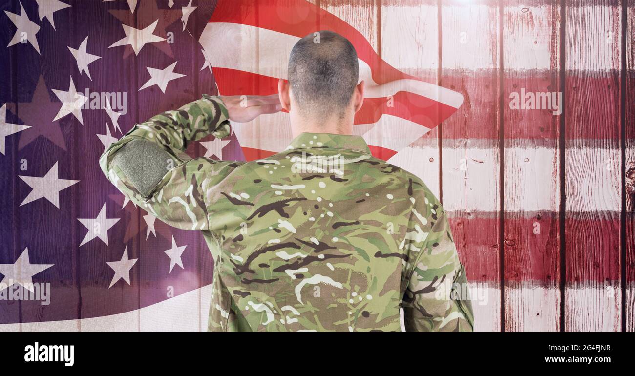 Waving american flag over soldier hi-res stock photography and images ...