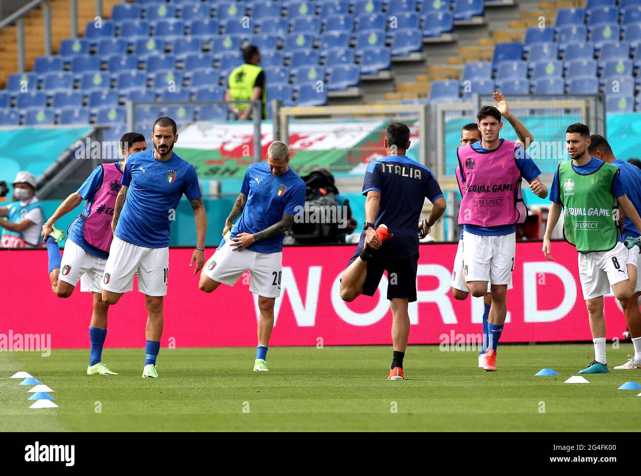 Italy players warm up on the pitch ahead of the UEFA Euro 2020 Group A ...