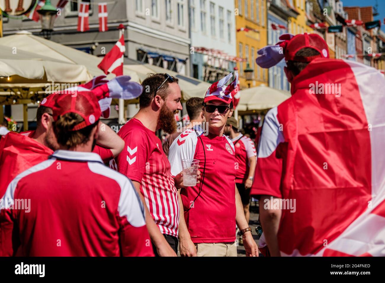 Copenhagen, Denmark. 17th, June 2021. Danish football fans dressed with ...