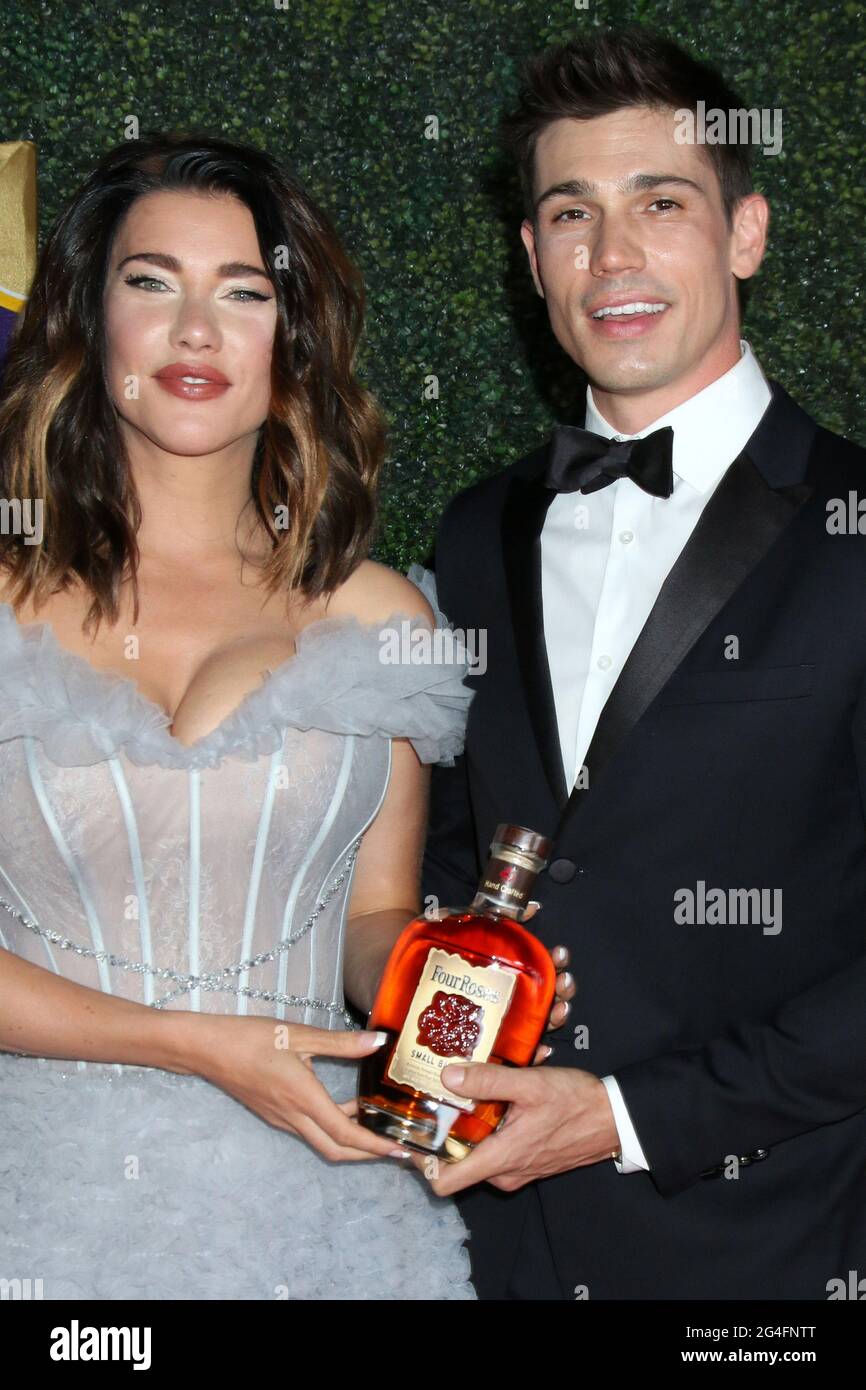 LOS ANGELES - JUN 12: Jacqueline MacInnes Wood and Tanner Novlan with ...