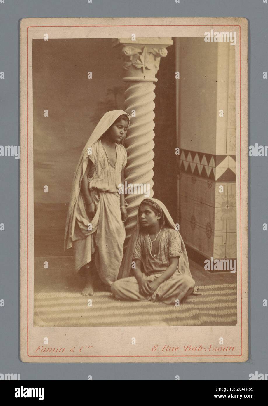 Two children for a column Stock Photo - Alamy