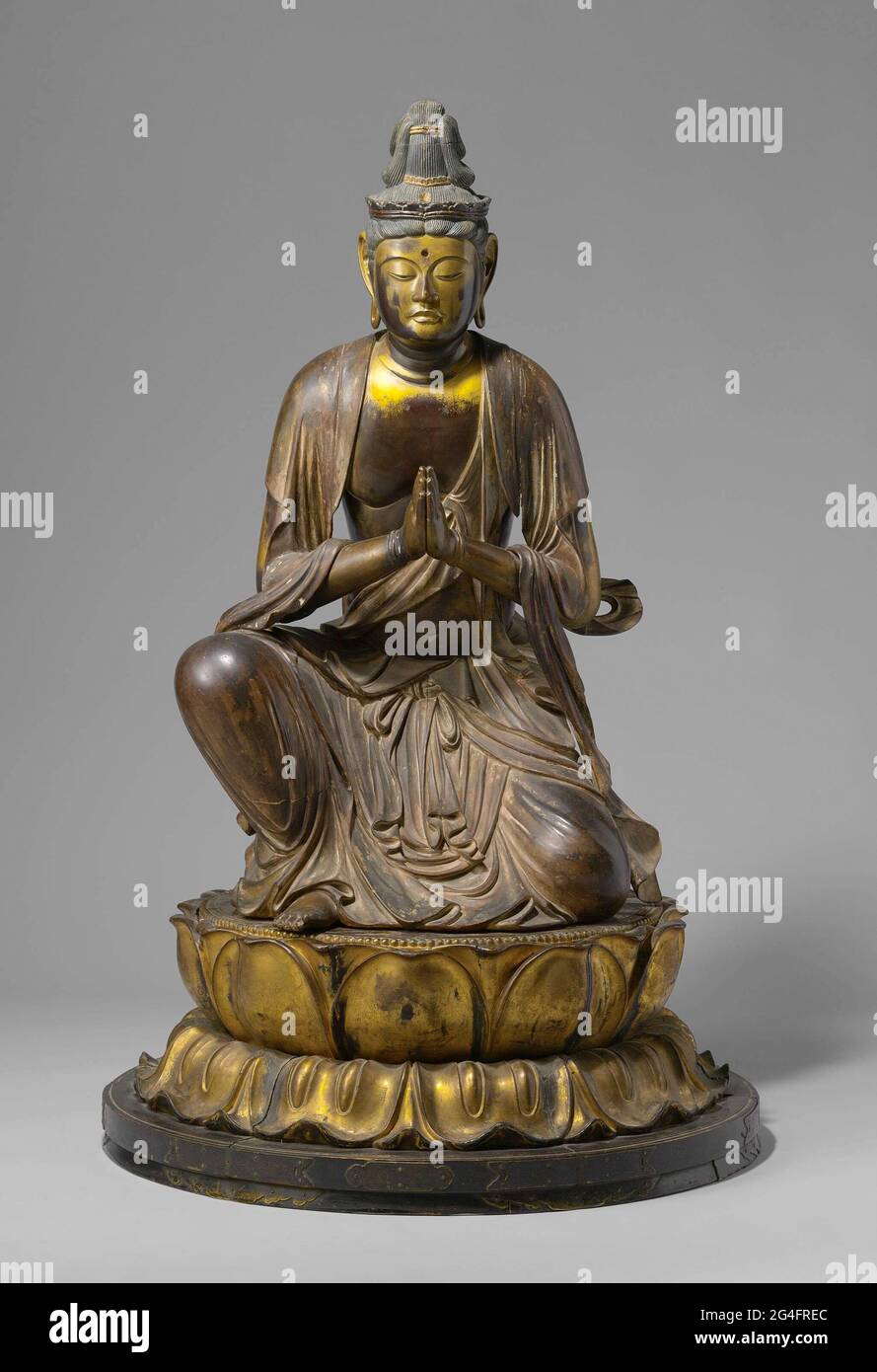 . The Bodhisattva Seishi, half squat half kneeling and with the hands ...