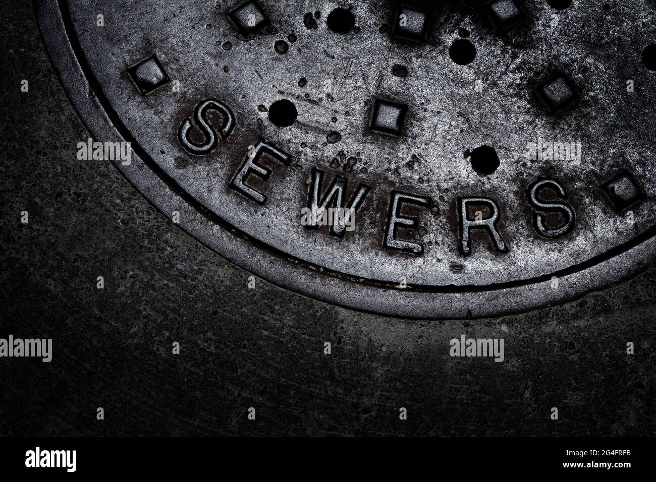 Sewer manhole cover maintenance iron steel access to utility Stock ...