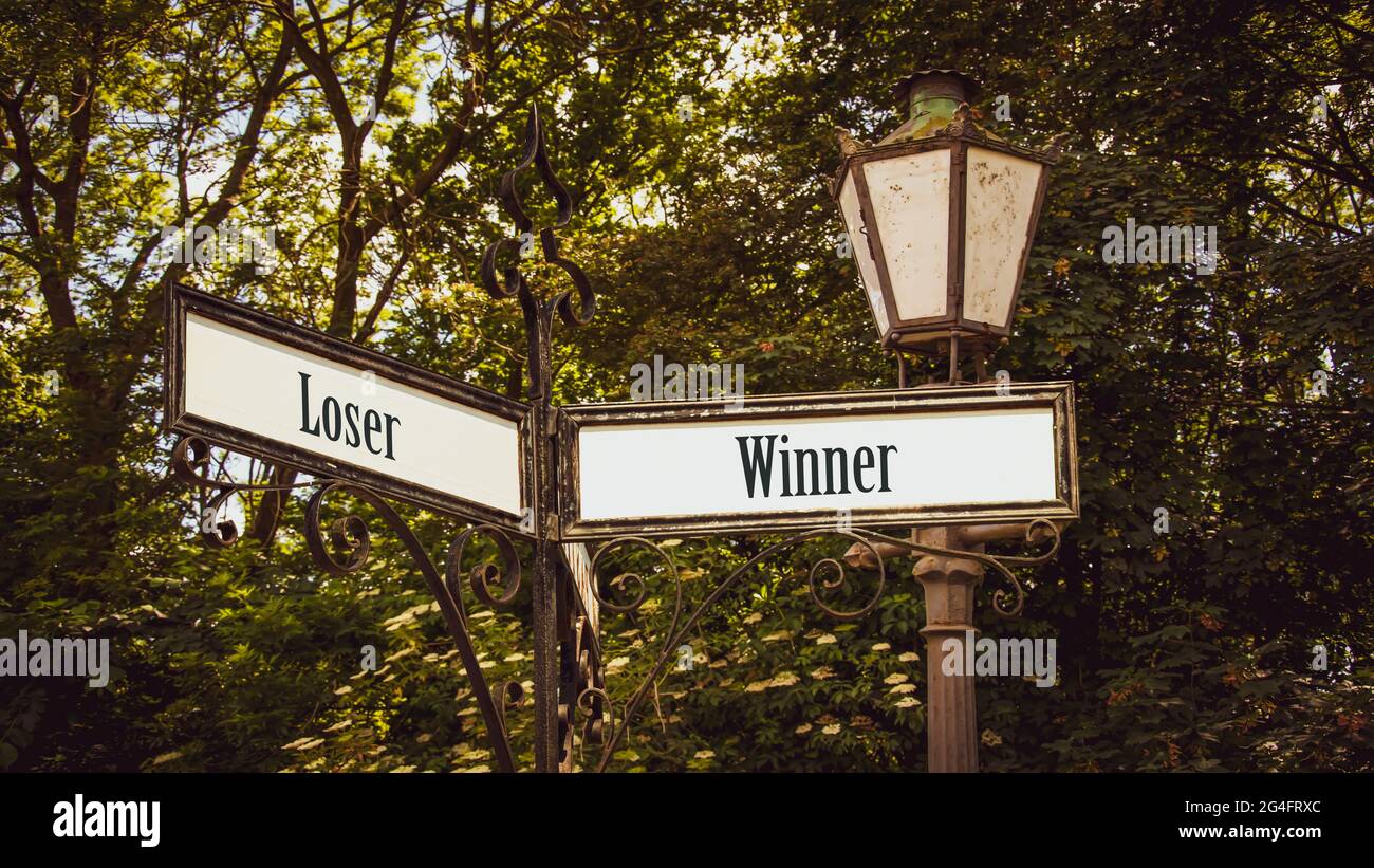 Street Sign the Direction Way to Winner versus Loser Stock Photo - Alamy