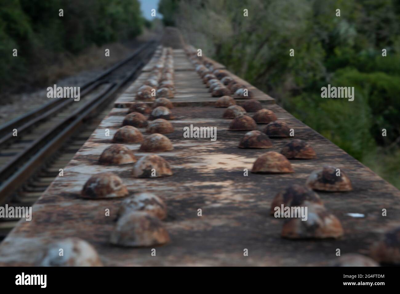 Rivets in metal structure of railway bridge. Transport infrastructure ...