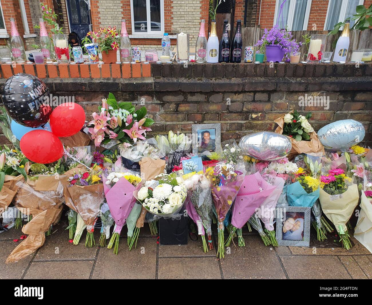 London, UK, 21 June 2021: Tributes line a wall on Bedford Hill in ...