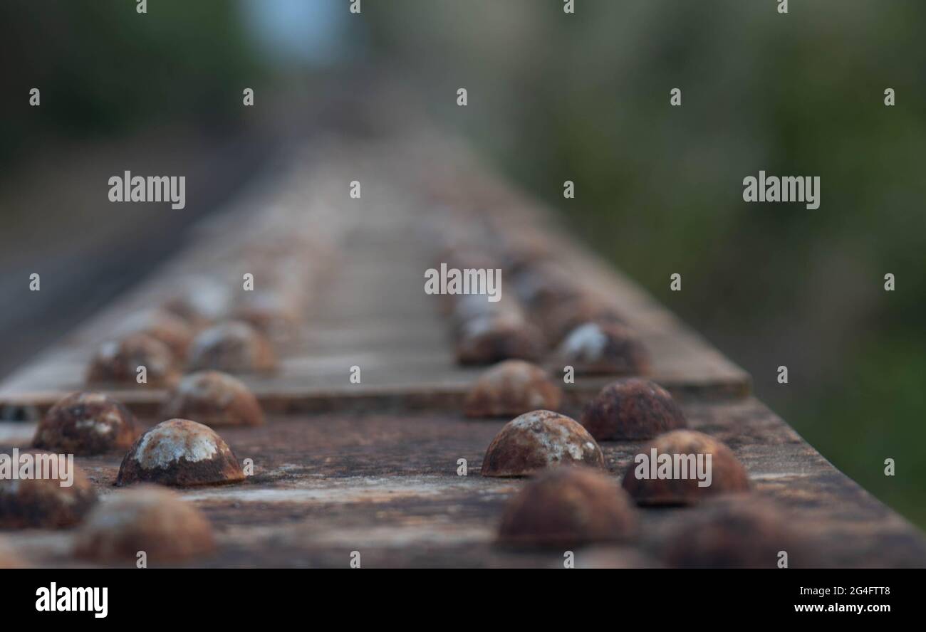 Rivets in metal structure of railway bridge. Transport infrastructure ...