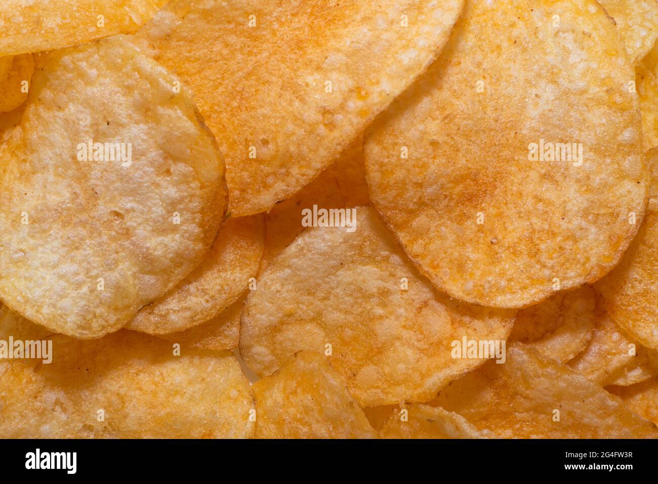 Chips. Background of chips in close-up. Chips are a harmful product ...