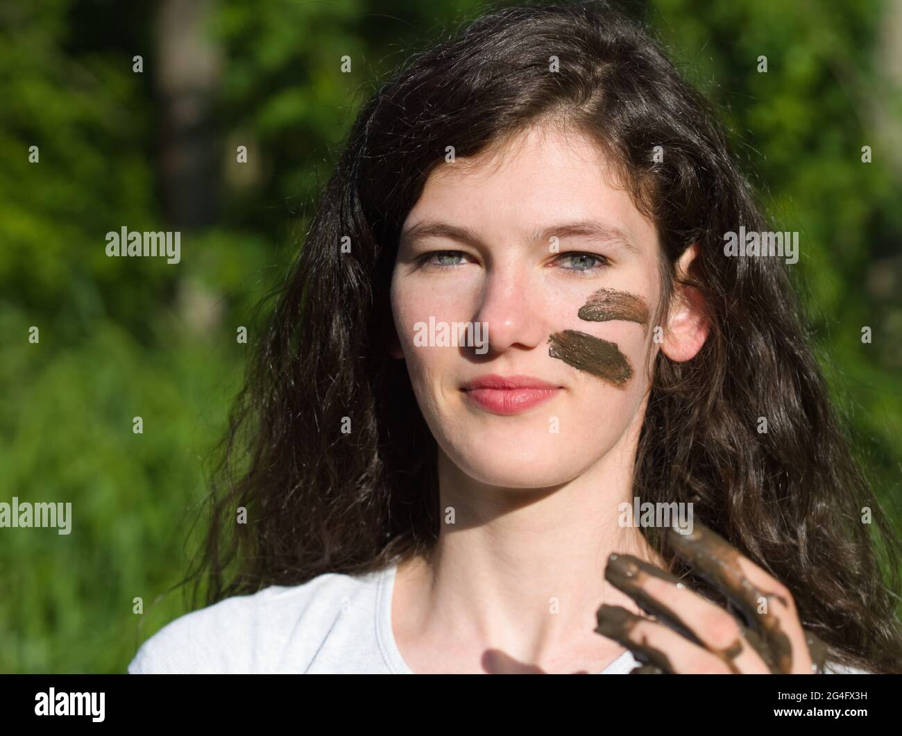 Mud festival woman hi-res stock photography and images - Alamy