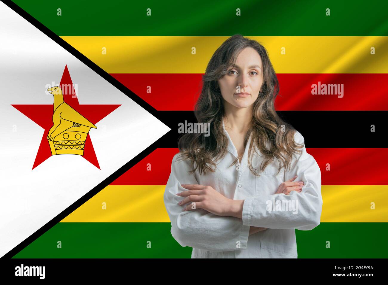 Medicine in Zimbabwe Happy beautiful female doctor in medical coat ...