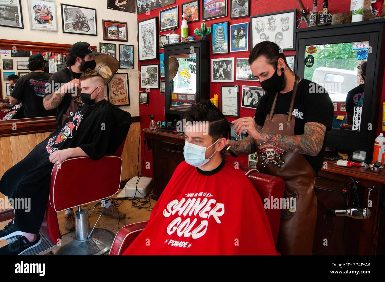 Inside an American style barbershop in the UK Stock Photo - Alamy