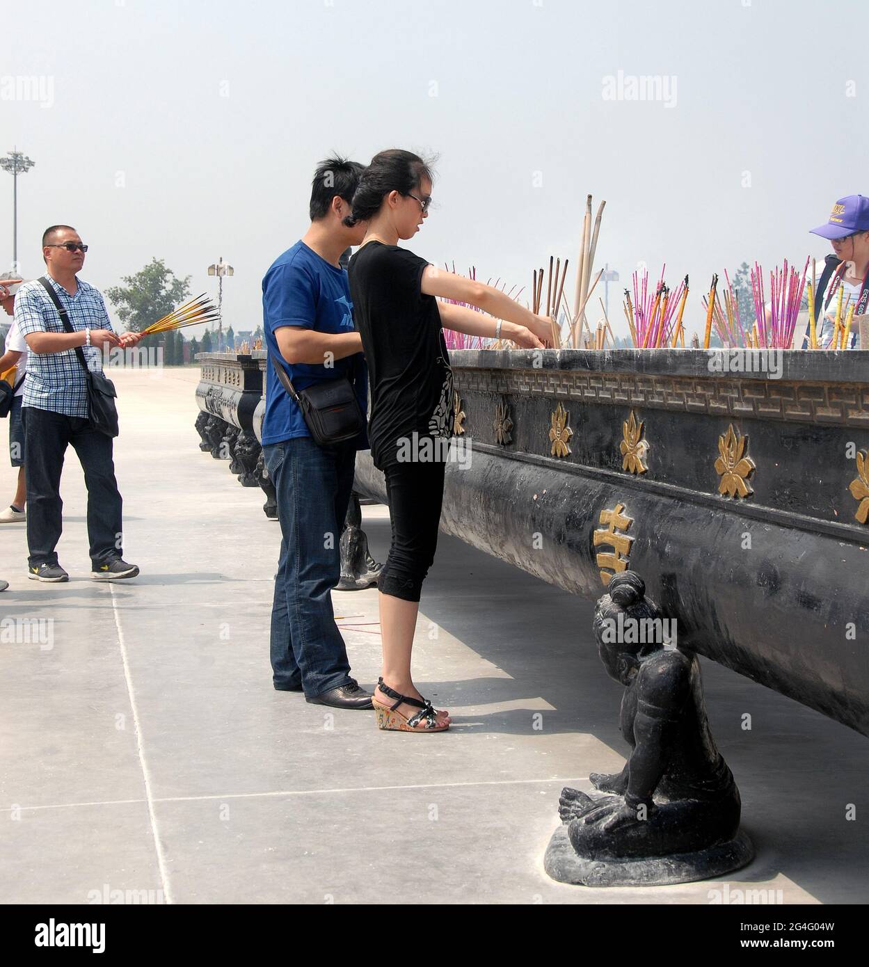 Famen Temple, Shaanxi Province, China: Worshipers burning incense in ...