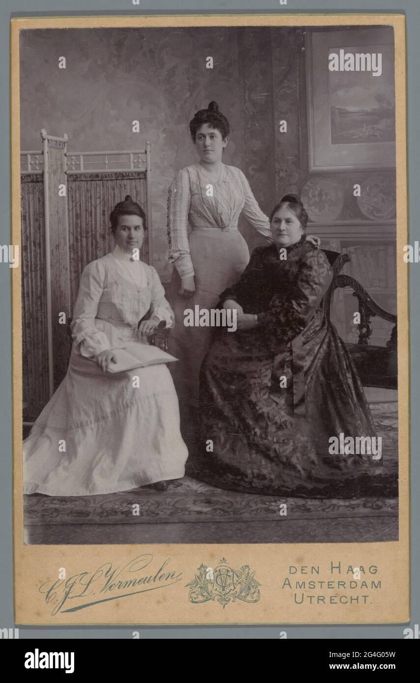 Studio portrait of three unknown women Stock Photo - Alamy