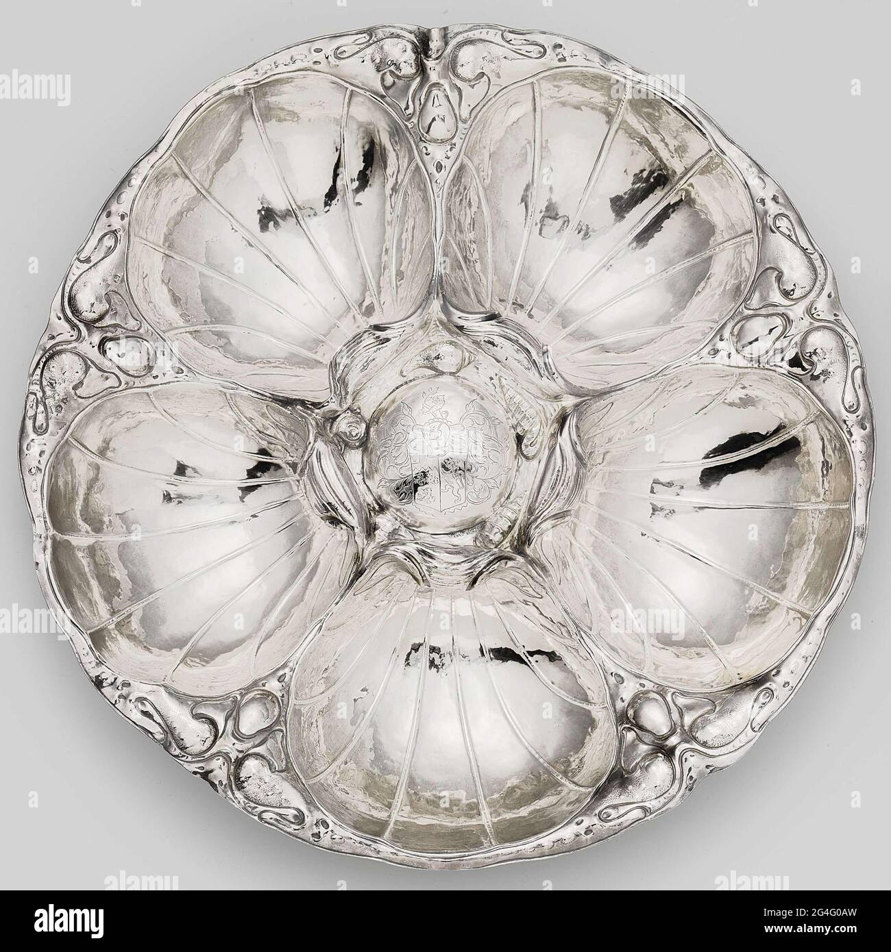 . Scale of silver, formed by five deep bins in the form of shells. In ...