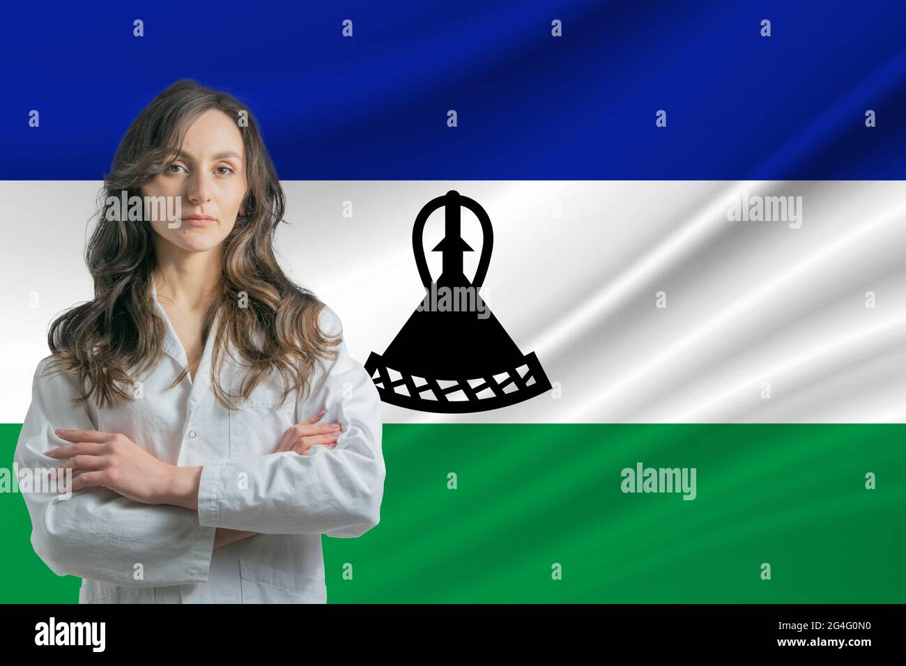 Medicine in Lesotho Happy beautiful female doctor in medical coat ...