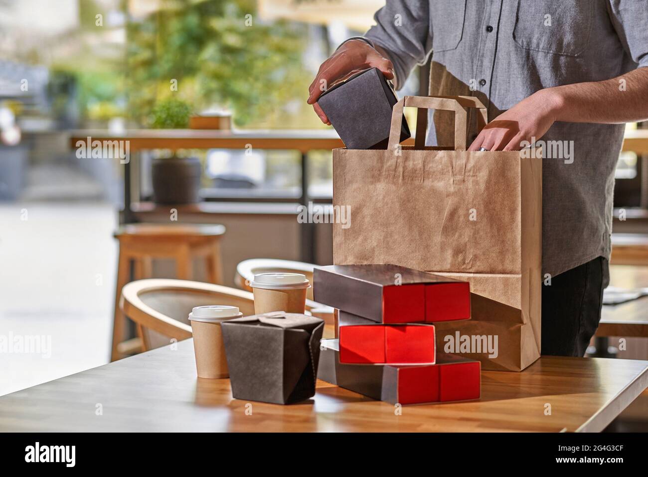 Bunch of blank disposable containers for takeout food stacked with ...
