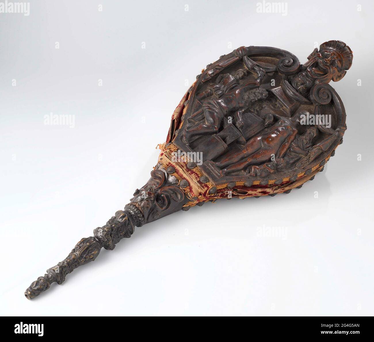 . Wind bellows of walnut. The top, embossed sculpted, shows the ...