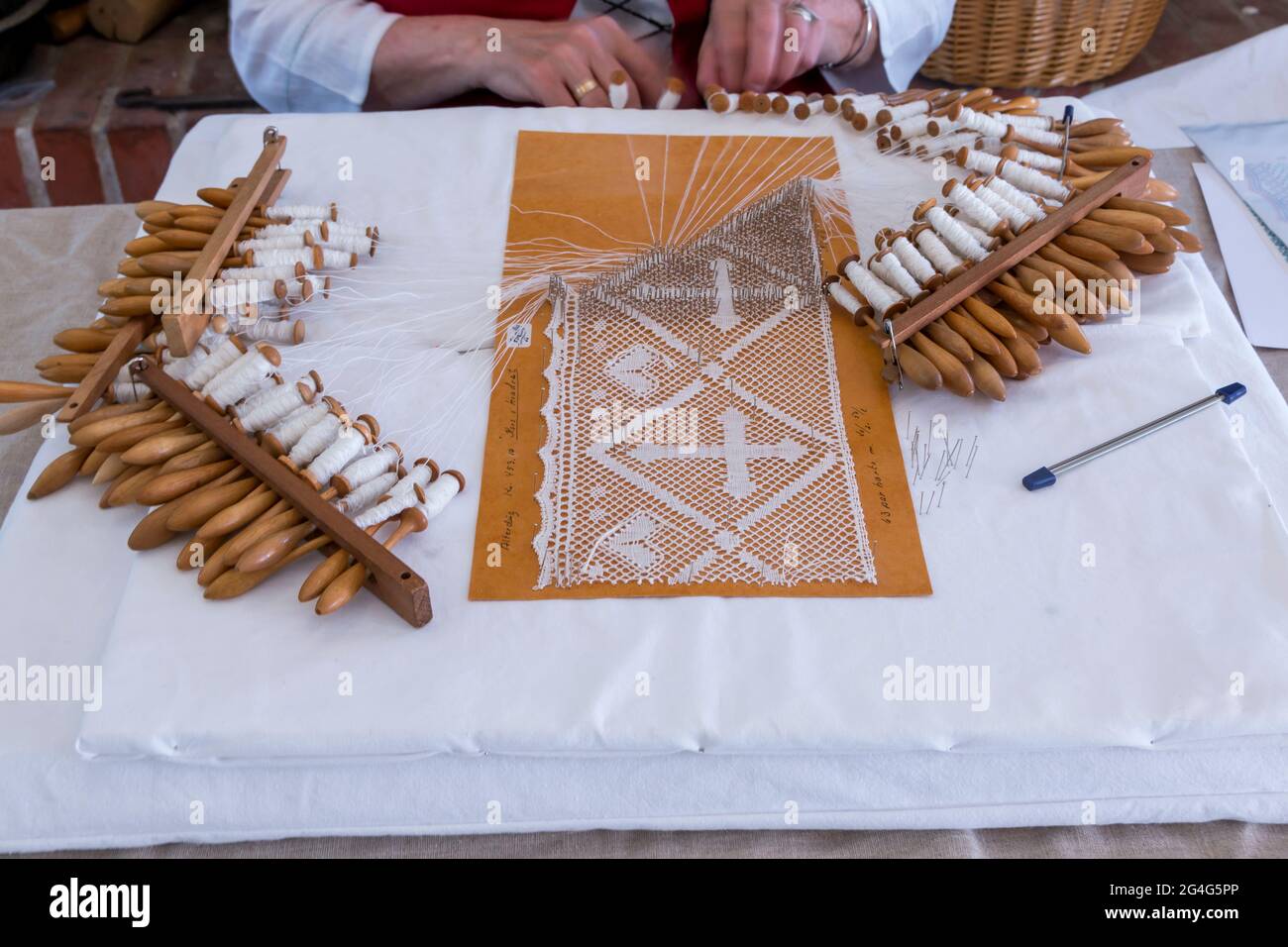 Auning, Denmark - 19 June 2021: Lace maker making lace like in the 18th ...