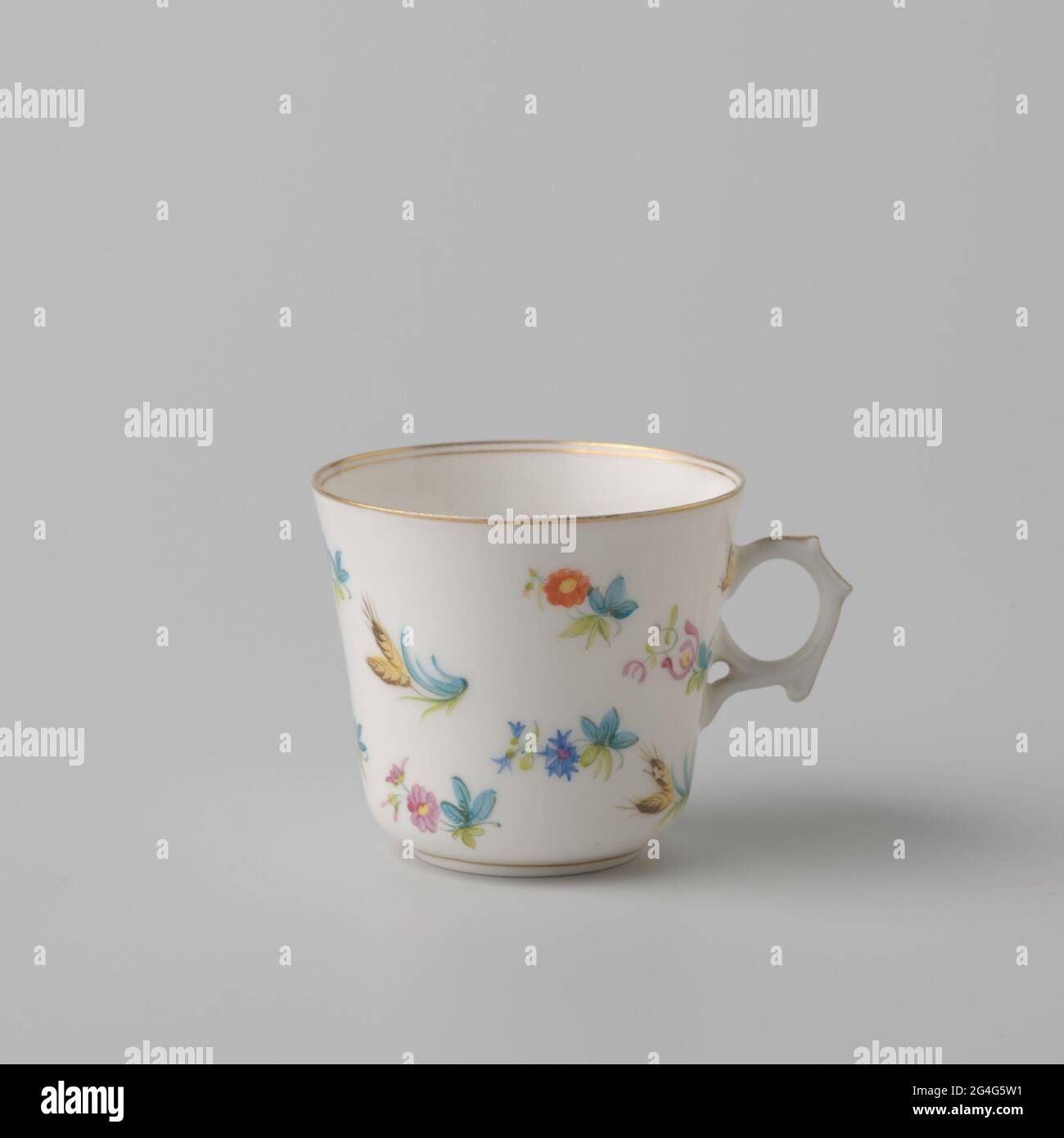 Tea cup with ear, painted with flowers and corners. Tea cup with ear ...
