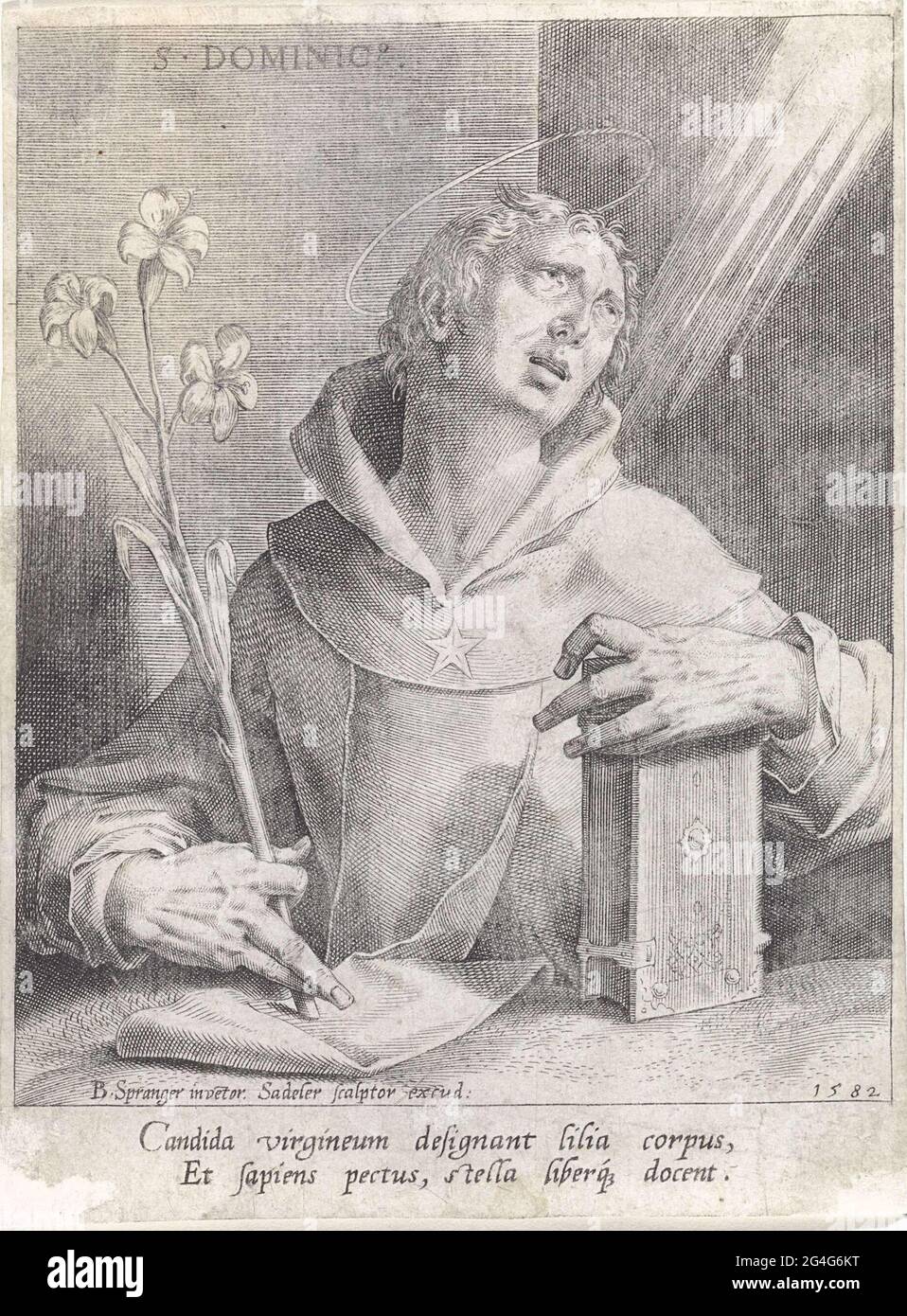 . The H. Dominicus, a lily and a Bible in the hands Stock Photo - Alamy