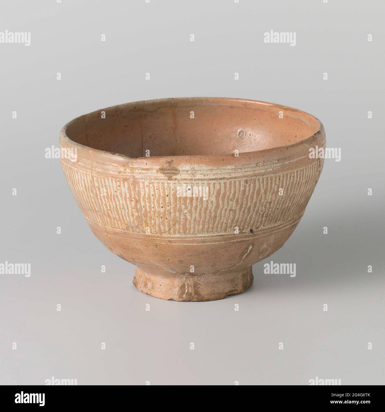 . Tea bowl of stoneware, covered with a white sludge and a red-brown ...