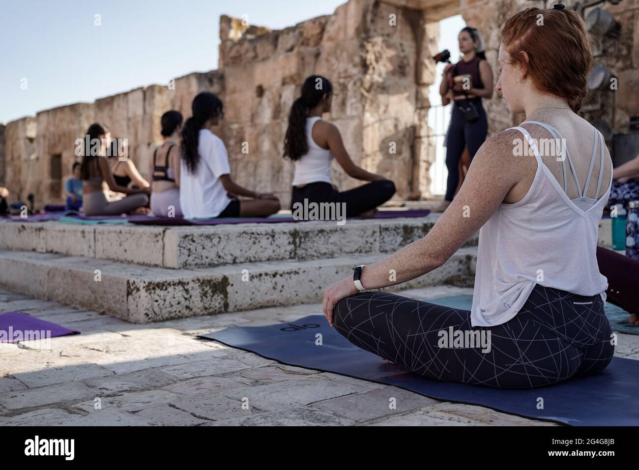 Jerusalem, Israel. 21st June, 2021. Practitioners take part in a sunset ...