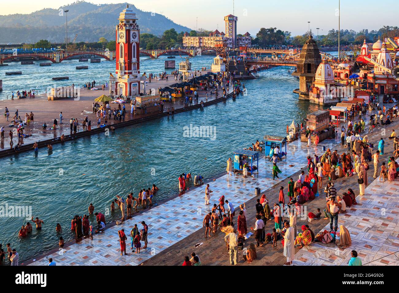 People in ritual ablutions at the Ganges river in the city of Haridwar ...