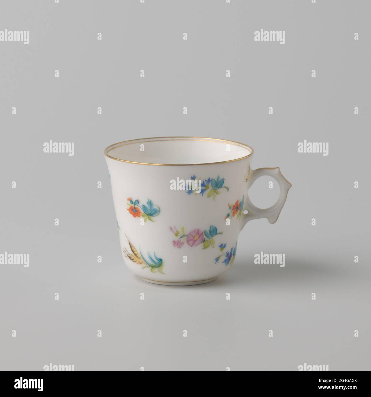 Tea cup with ear, painted with flowers and corners. Tea cup with ear ...