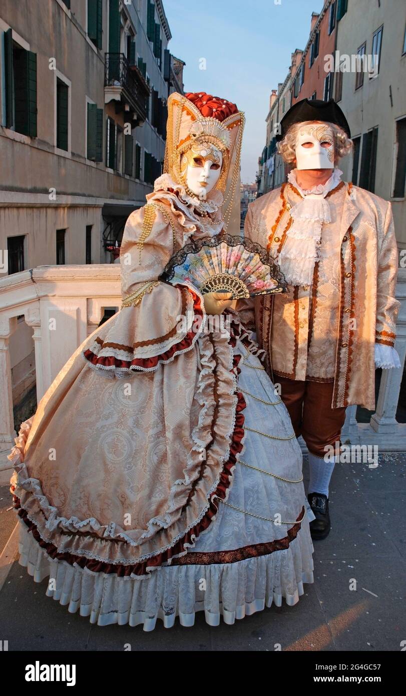 Venice, Italy - February 21st 2009. Carnival goers pose for photographs ...