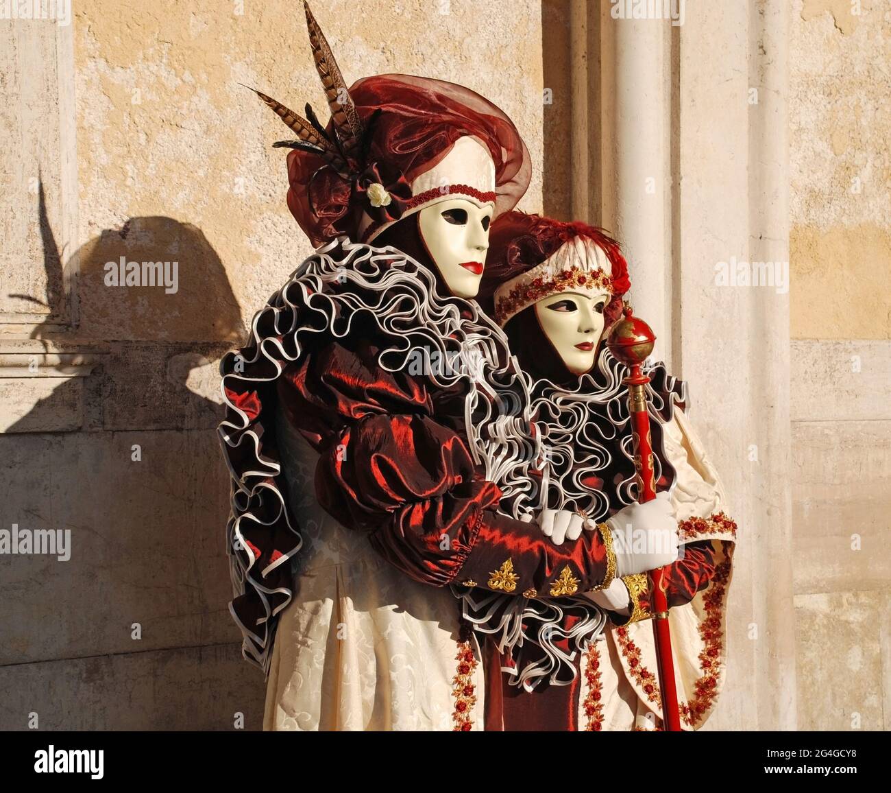 Venice, Italy - February 21st 2009. Carnival goers pose for photographs ...