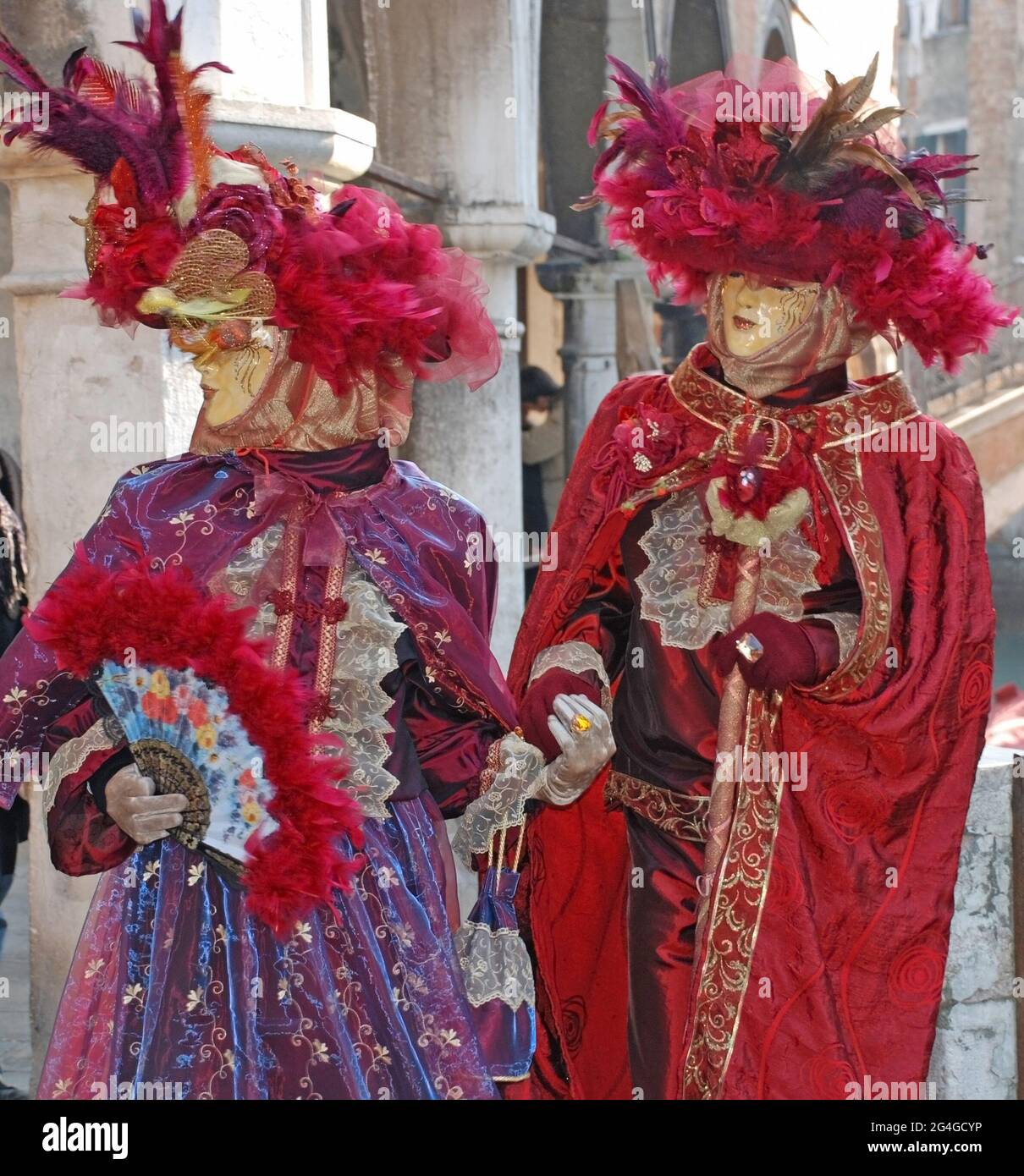 Venice, Italy - February 21st 2009. Carnival goers pose for photographs ...