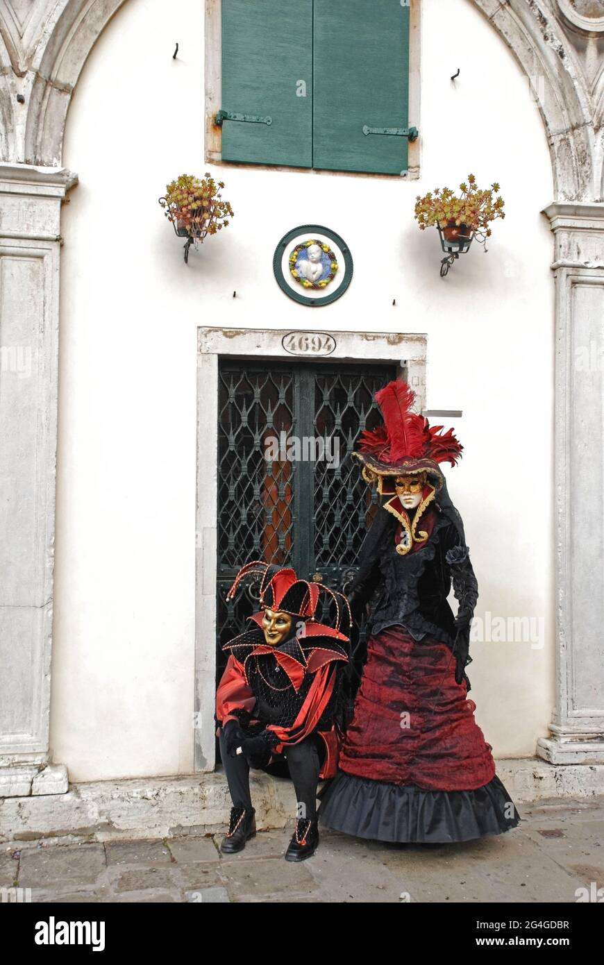 Venice, Italy - February 5th 2008. Carnival goers pose for photographs ...