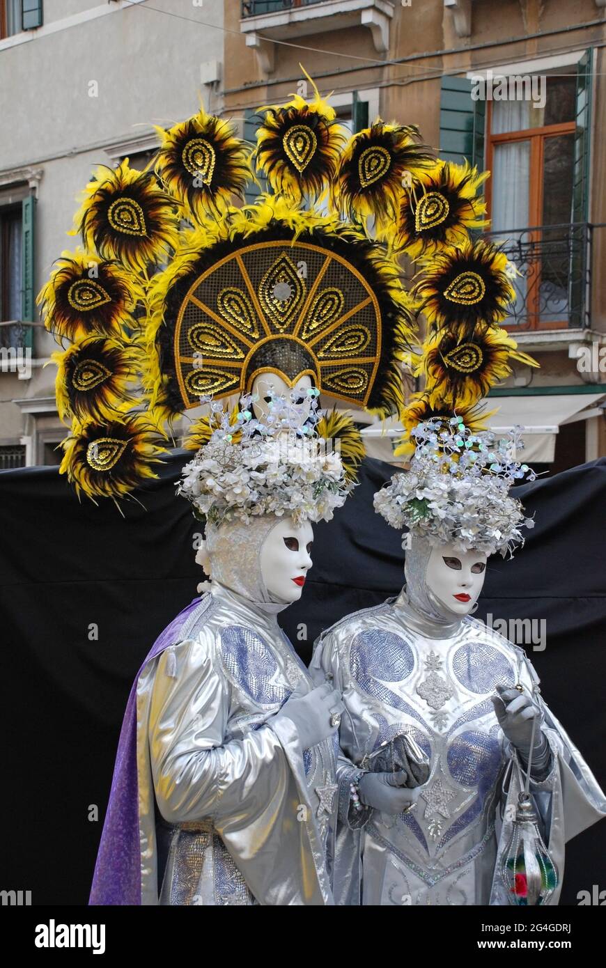 Venice, Italy - February 5th 2008. Carnival goers pose for photographs ...