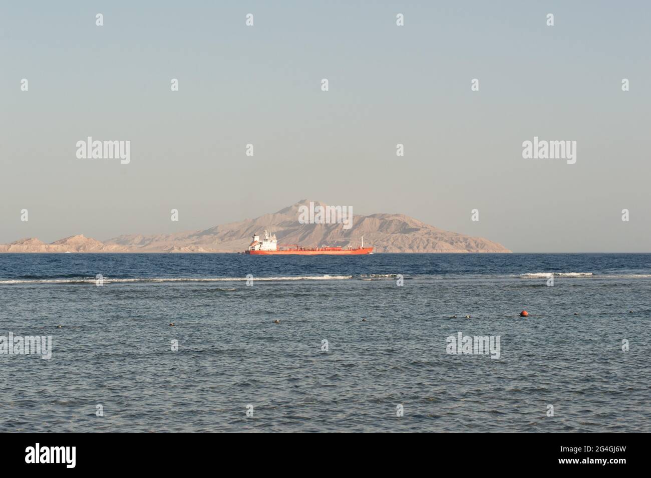 Cargo ship at sea Stock Photo - Alamy
