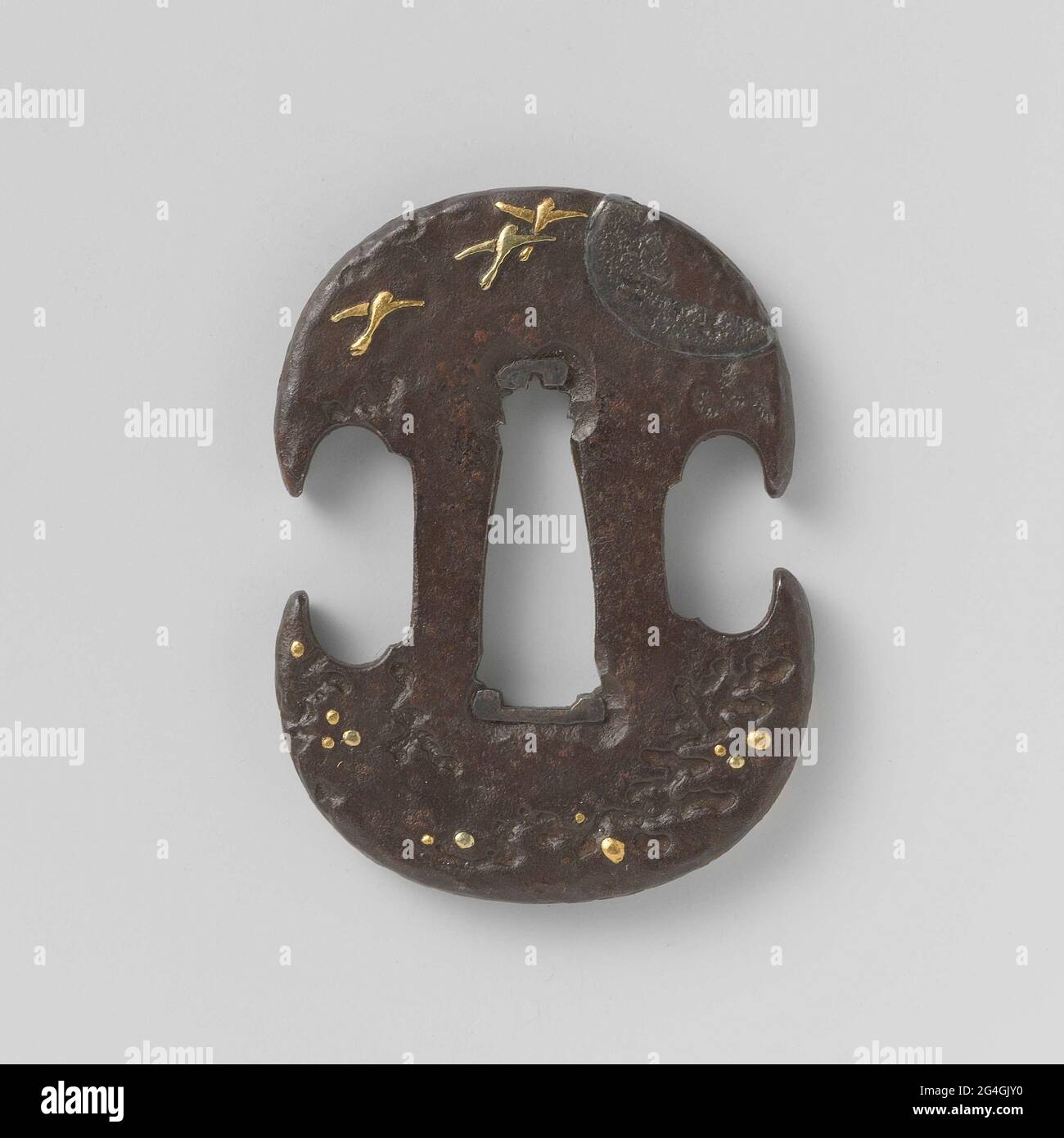 . Tsuba for a dagger with on the front in Iroe-Taka-Zogan geese and the ...