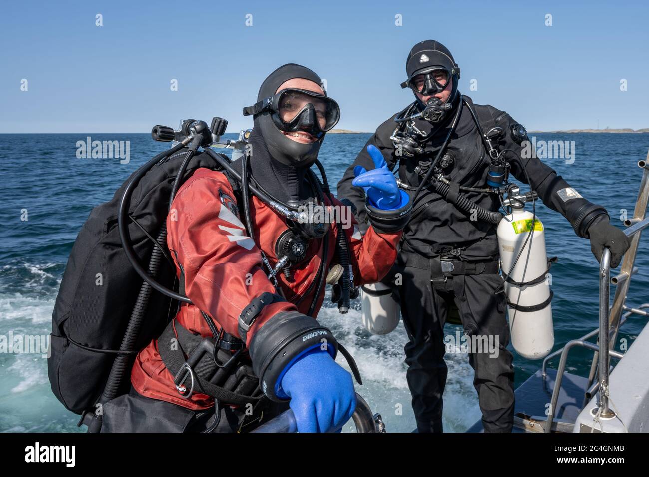 April 17, 2021 - Hamburgsund, Sweden: Two scuba divers ready to enter ...
