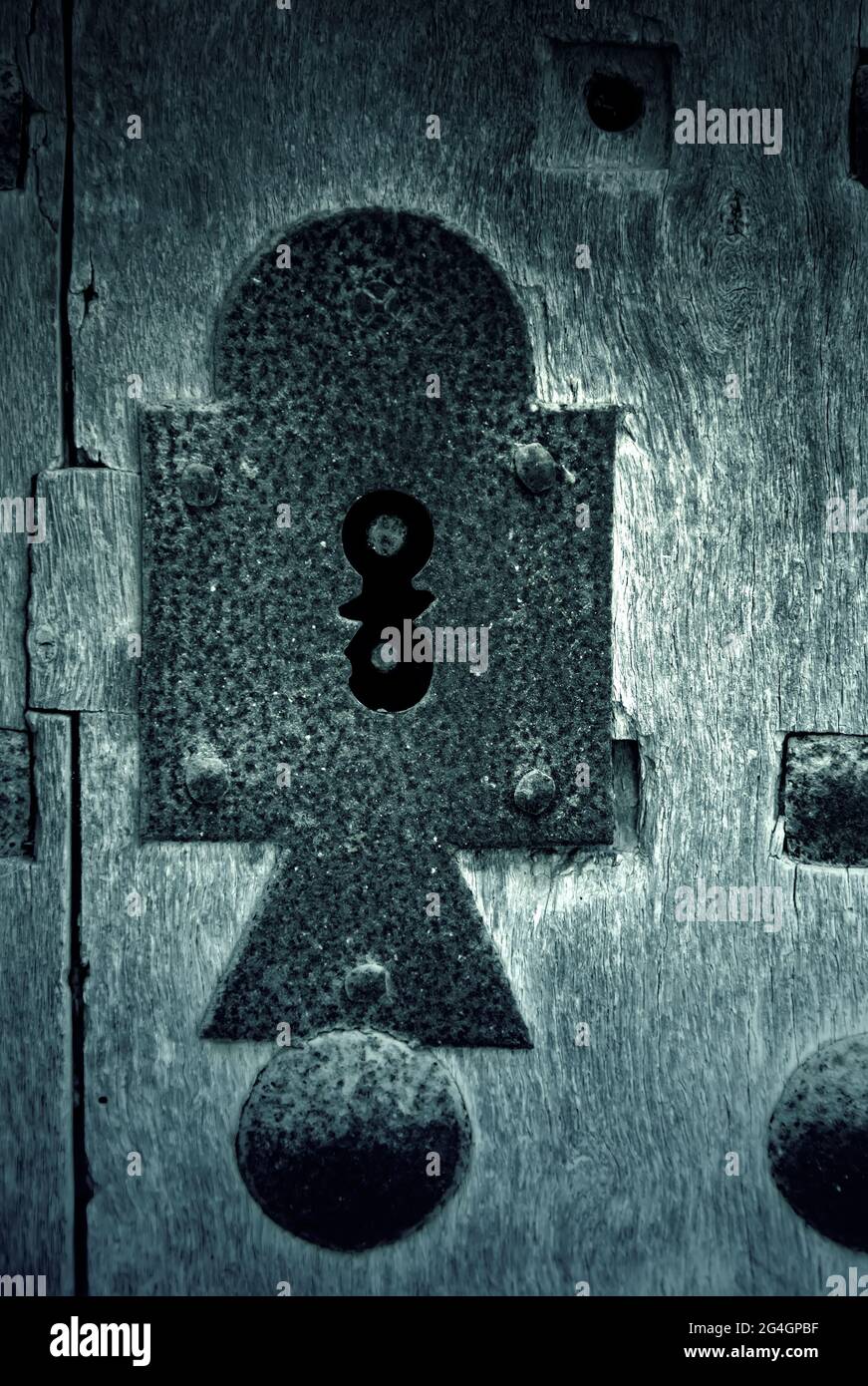 Detail of old door with decorated lock, history and security Stock ...
