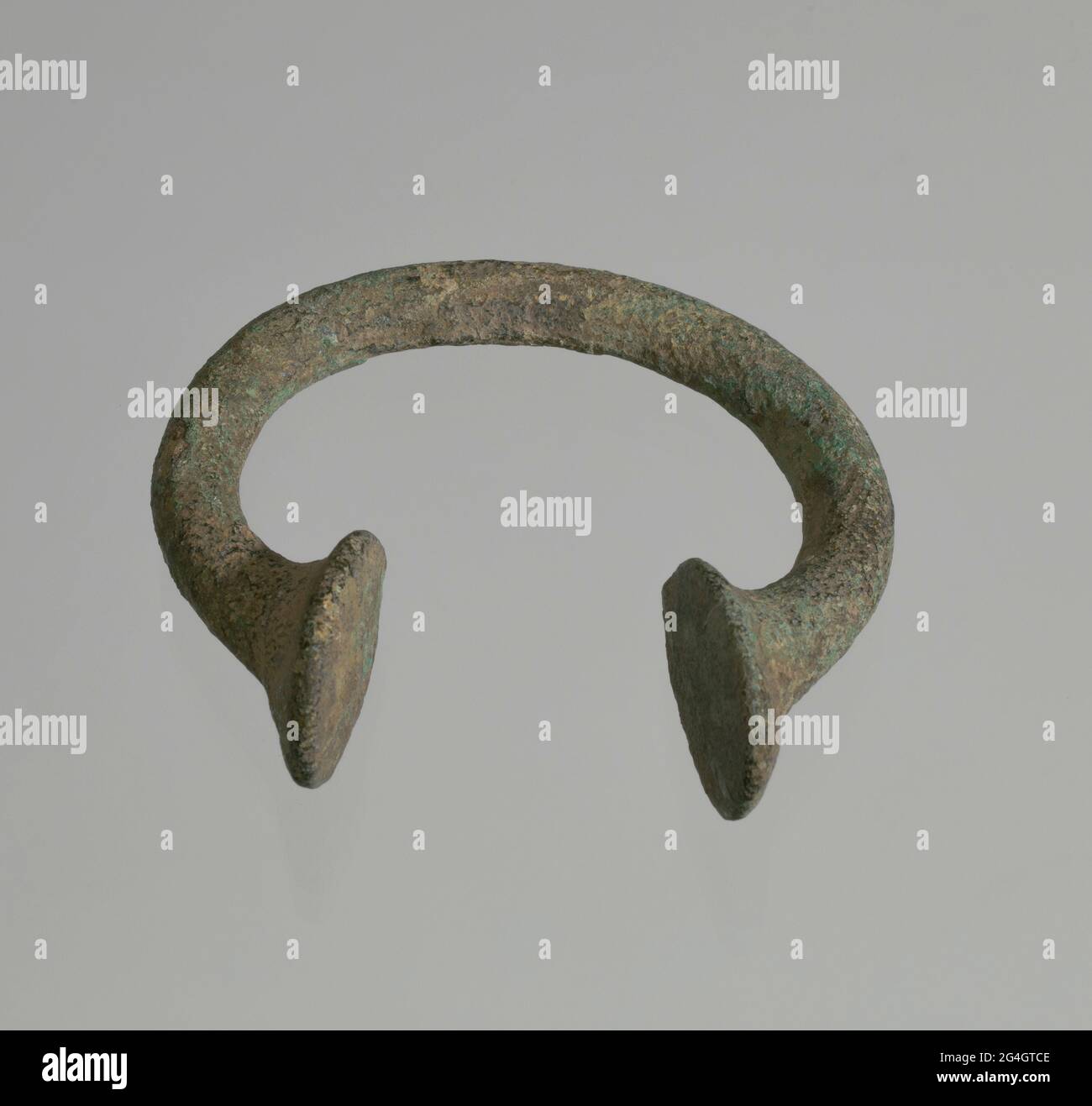 Manilla, a form of currency that circulated in West Africa, in a semi ...